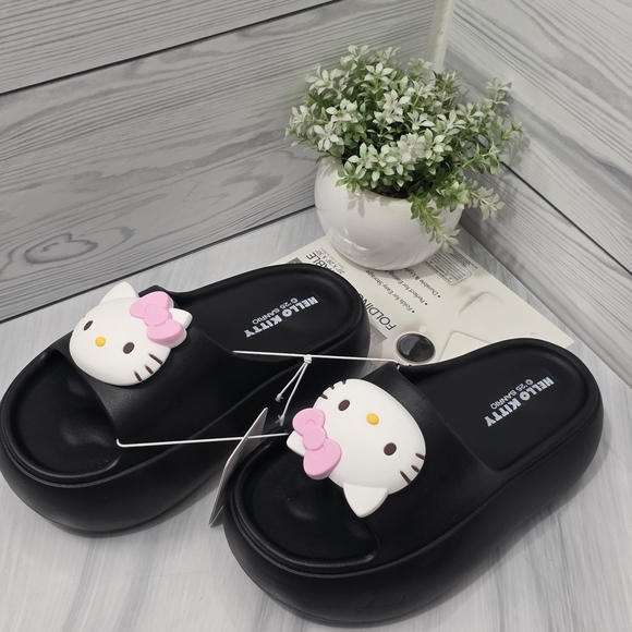 Hello Kitty | Shoes | Hello Kitty Black Slides With Pink Bow | Poshmark